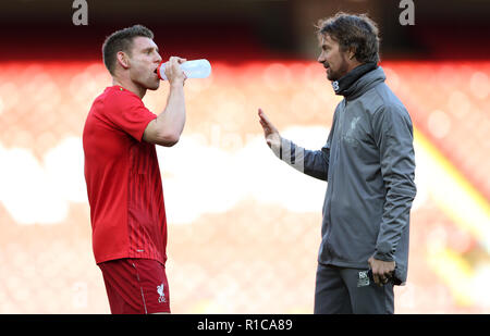 Liverpool's James Milner with Andreas Kornmayer - Head of Fitness and ...