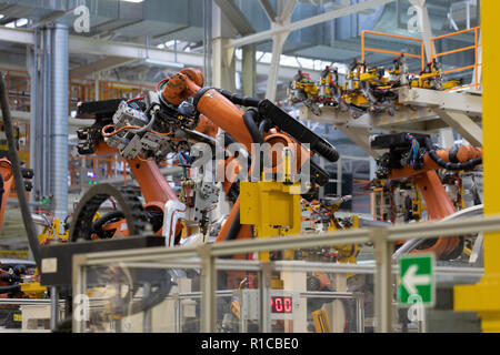 process of welding cars. Modern Assembly of cars at plant. automated ...