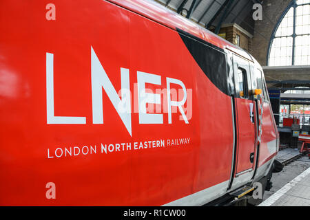 A train with LNER (London North Eastern Railway) livery at Peterborough ...