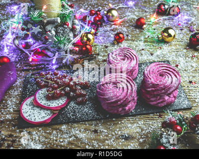 Red currant marshmallow, handmade. A cup of coffee with dessert on the ...