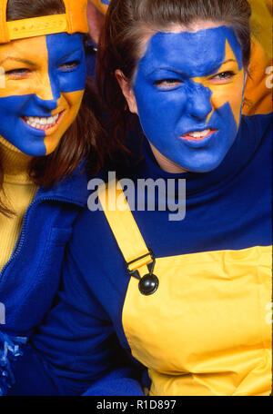 Enthusiastic Sports Fans with Painted Faces at a Football game, USA ...