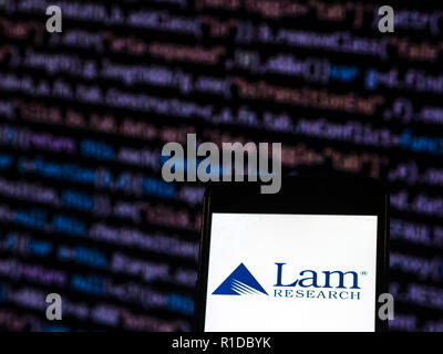 Lam Research Corporation logo seen displayed on smart phone Stock Photo ...