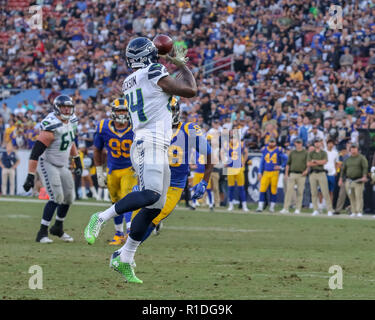 Seattle Seahawks tight end Ed Dickson (84) tries to land closer to the ...