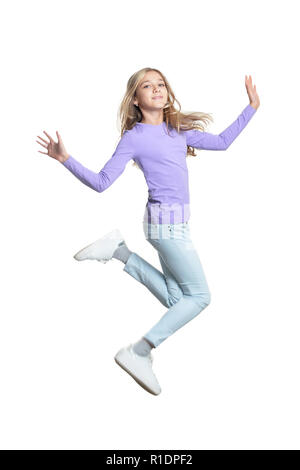 full length of cheerful kid in headband with bow holding wireless ...