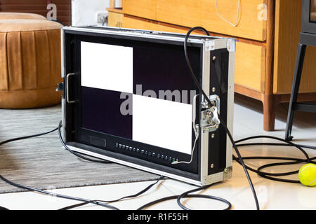 Behind the scene. Cameraman and director shooting the film scene with ...