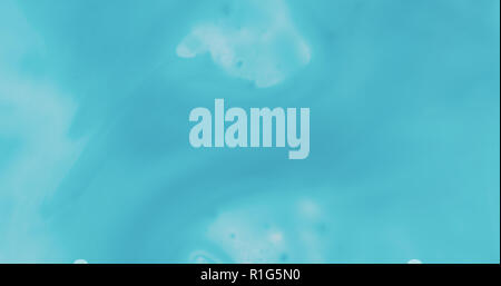 blue ink drops spreads on white plastic background, wide photo Stock ...