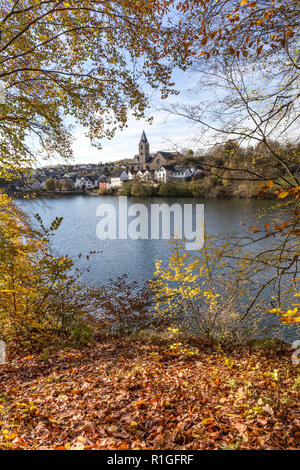 Traditional German village as viewed from across the Ulmen Maar, Ulmen ...