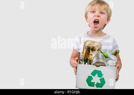 Boy holds box with recyclable materials Stock Photo - Alamy
