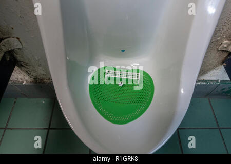 Urinal with target Stock Photo - Alamy