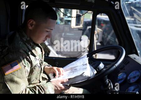 Heavy Equipment Transport Systems (HET) sit in the 32nd Transportation ...