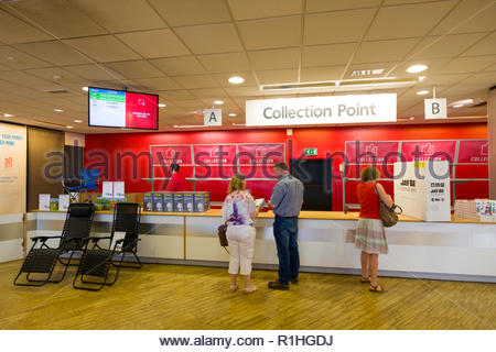 Collection point inside a shop, Argos, UK Stock Photo - Alamy