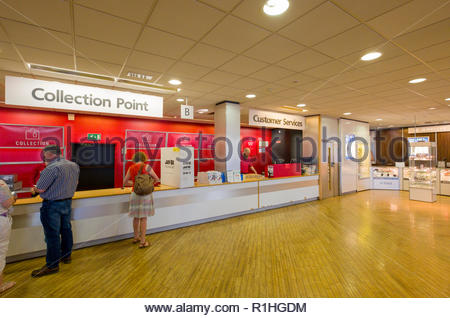 Collection point inside a shop, Argos, UK Stock Photo - Alamy