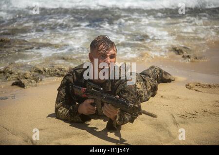 U.S. Marine Corps Cpl. Ethan Davenport, a team leader with Range Patrol ...