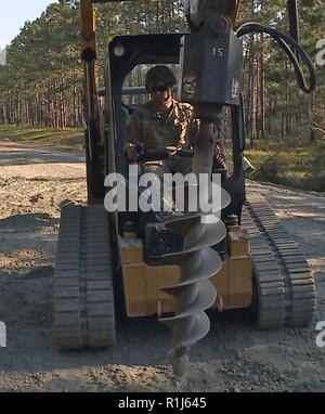A soldier, with the 57th Sapper Company, 27th Engineering Battalion ...