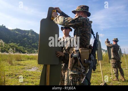 U.S. Marine Corps Cpl. Liam Smith, airborne and air delivery specialist ...