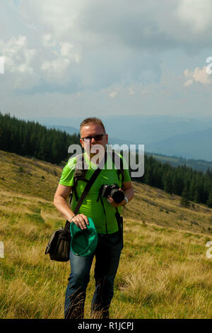 The mountains against the sky on a sunny day Stock Photo - Alamy
