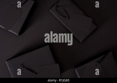 Black Friday sale concept. Shopping paper bag and gift box with curly ...