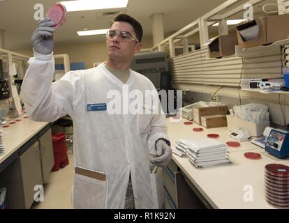 Airman Levi Hensley, a laboratory Phase II student at David Grant U.S ...