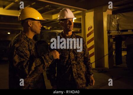 U.S. Marine Corps Col. Boyd A. Miller, right, Commanding Officer of ...