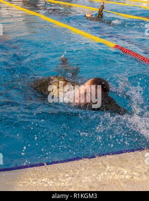 U.S. Army Soldier performs the swim test portion of the German Armed ...