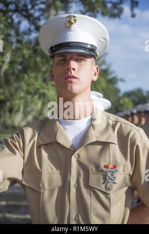 U.S. Marine Corps Pfc. Jacob Hutchison, an engineer equipment mechanic ...