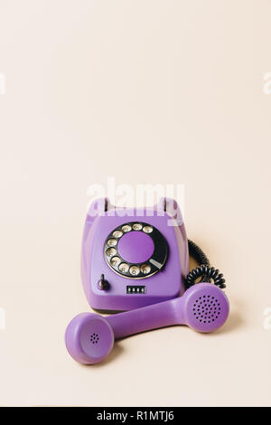 vintage retro violet rotary telephone isolated on white background ...