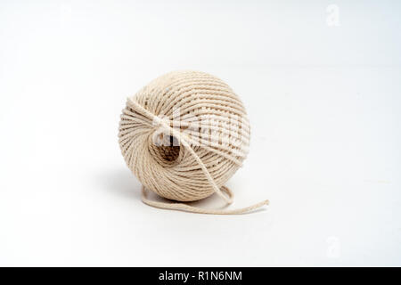 Ball of string,wound, coiled isolated on white Stock Photo - Alamy