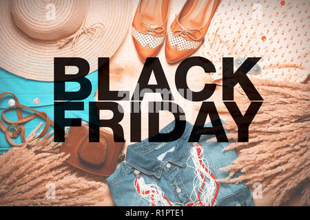 Black friday poster. Modern women outfit on background Stock Photo - Alamy