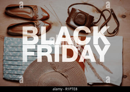 Black friday poster. Modern women outfit on background Stock Photo - Alamy