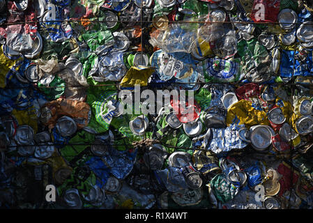 Pressed cubes of cans for recycling at the waste segregation station in ...