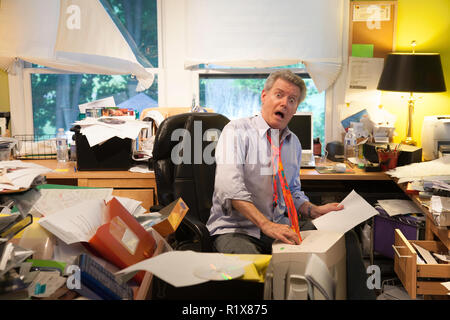 Businessman in Hoarders' Messy Home Office, USA Stock Photo: 72586853 ...