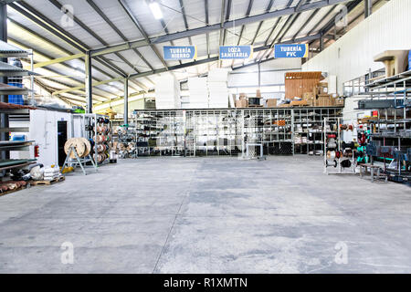 A big factory building and nice blue sky Stock Photo - Alamy