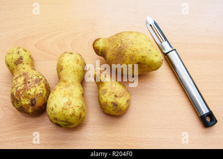 Odd shaped potato. Non standard shape food. Wonky veg. Imperfect potato ...
