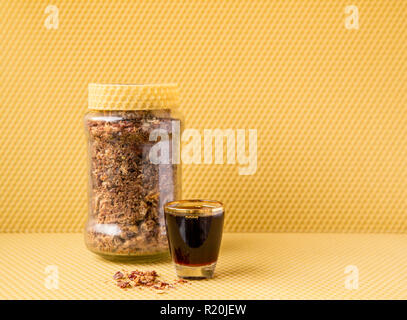 Propolis or bee glue is a resinous mixture that honey bees produce by ...