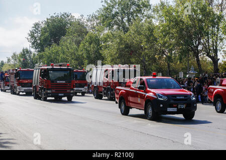 Greek Fire Brigade Service trucks with firefighters in uniform during a ...