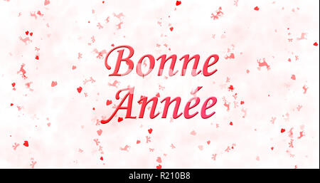 Bonne Annee (French Happy new Year) written with a sparkler isolated on ...