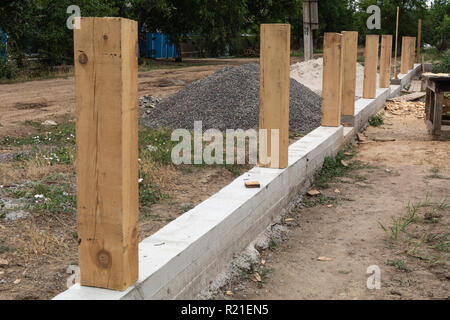 Construction of reinforced concrete retaining wall with buttress. Tower ...