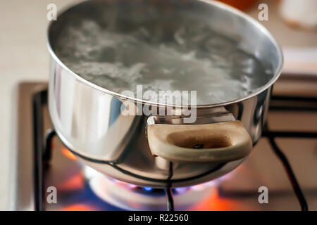 Pot boiling over Stock Photo - Alamy