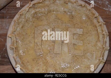 a pie with lettering spelling the word PIE on the top of it Stock Photo ...
