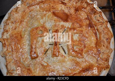 a pie with lettering spelling the word PIE on the top of it Stock Photo ...