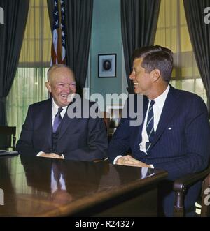 US PRESIDENT JOHN F KENNEDY WITH DWIGHT EISENHOWER LEAVING WHITE HOUSE ...
