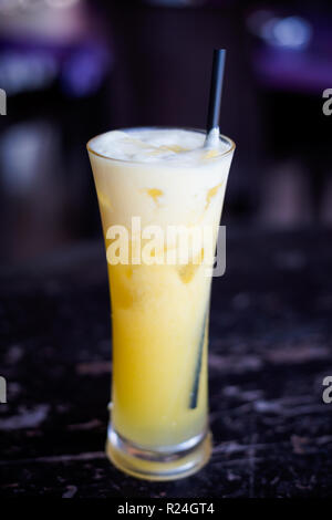 delicious ripe mango prepared in hedgehog cut style with natural green ...