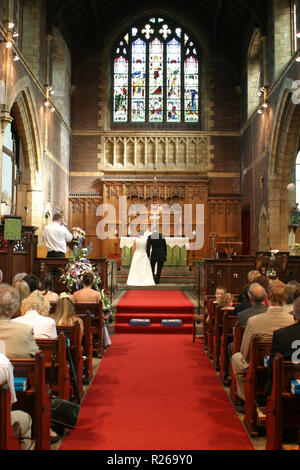 Congregation inside church stained glass in St. Denys Church, Cold ...