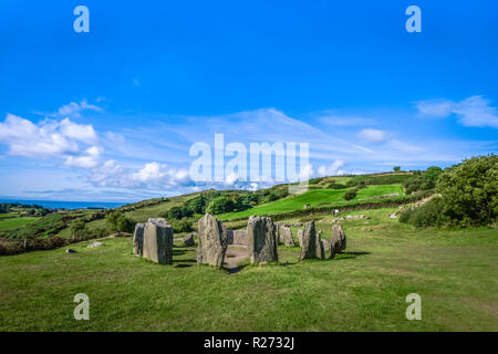 Stone monument on the meadow Stock Photo - Alamy