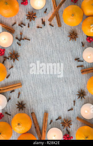 Flat lay Christmas border frame of lighting garland, yellow balls and ...