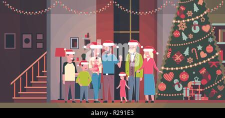 multi generation family in festive hats celebrating happy new year and ...