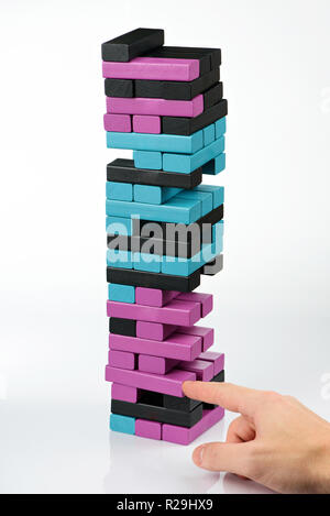 Hand holding wooden block toy isolated over white background Stock ...