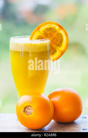 Lulo juice a traditional Colombian exotic fruit (Solanum quitoense ...