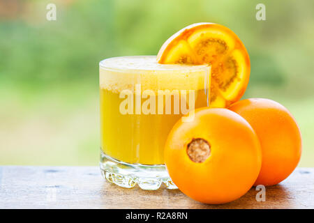 Lulo juice a traditional Colombian exotic fruit (Solanum quitoense ...