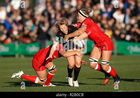 England’s Zoe Harrison is tackled by Canada’s Tyson Beukeboom (left ...